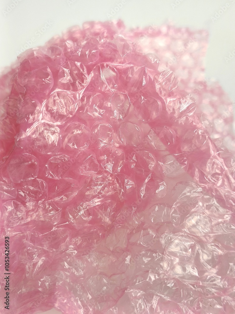 Bubble wrap close-up background photo. It is a pliable plastic material ...