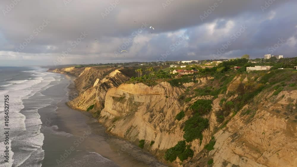 Aerial view flying along the coast of Blacks Beach in La Jolla ...