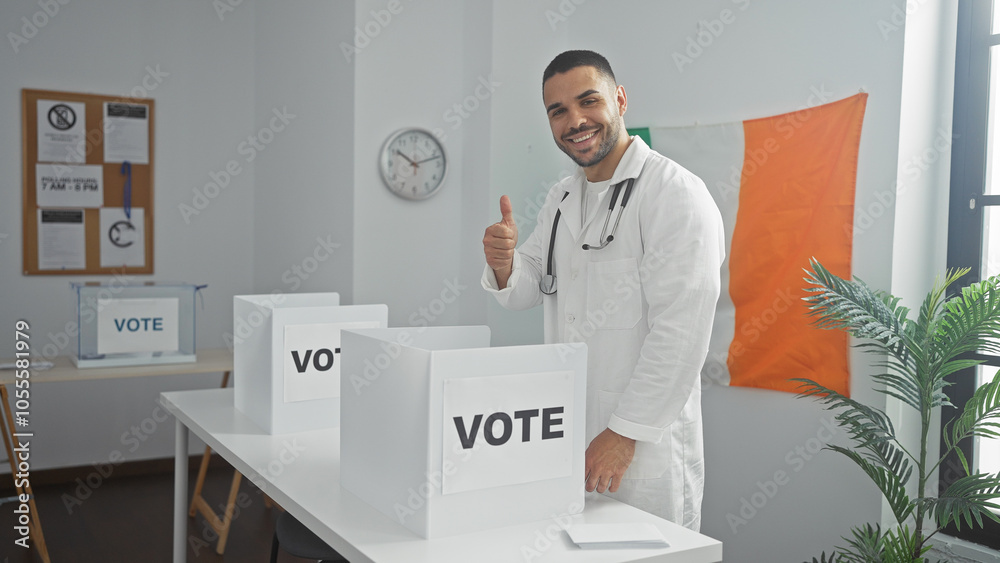 Hispanic man in medical coat thumbs up in irish electoral room with ...