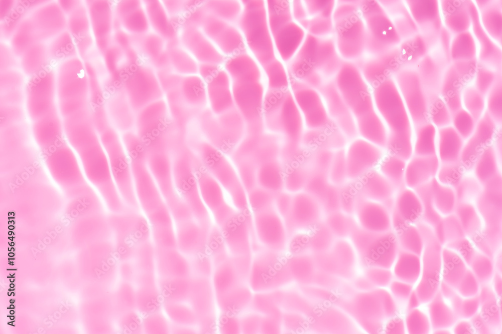Pink water bubbles on the surface ripples. Defocus blurred transparent ...
