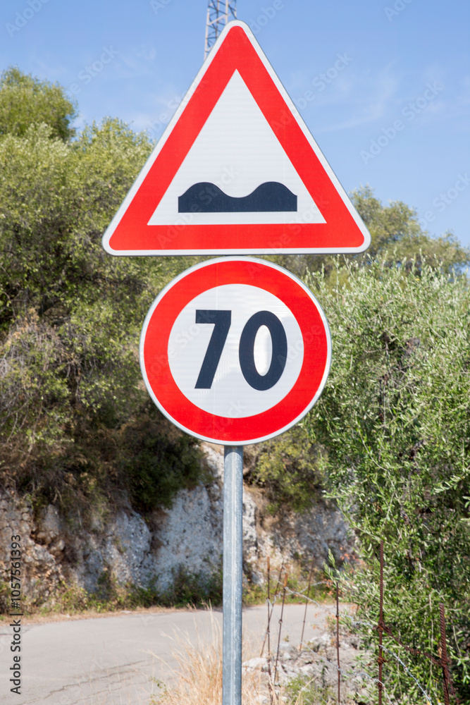 Italian road sign indicating danger of speed bumps. The lower road sign ...
