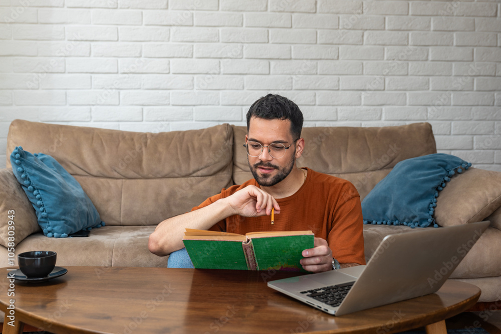 Young religious muslim man study and reading islamic book, interested ...
