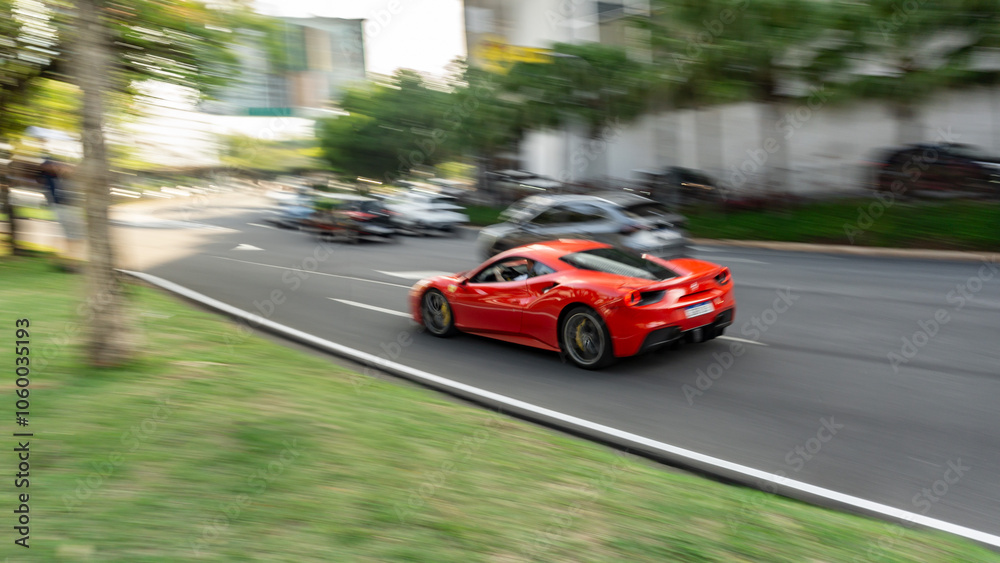 Red Ferrari 488 GTB speeding in city street, Luxury Supercar in ...