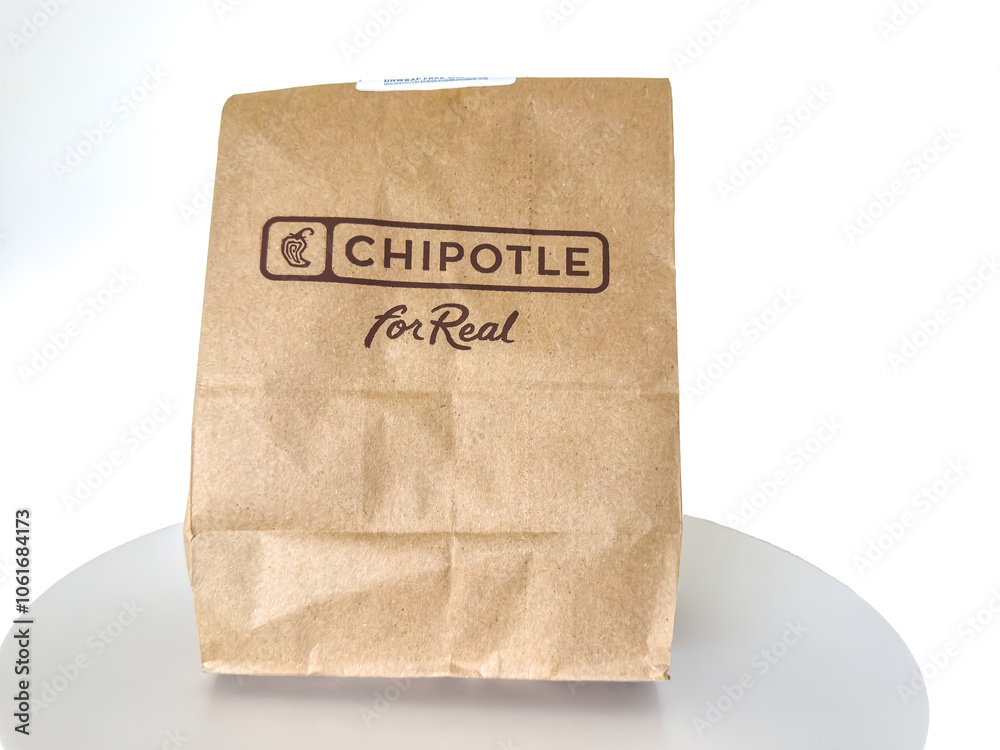 Calgary, Alberta, Canada. Nov 2, 2024. A Chipotle Mexican Grill bag. An ...