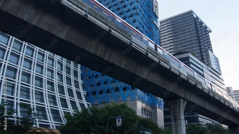 Modern Bangkok cityscape featuring an elevated train system, also known ...