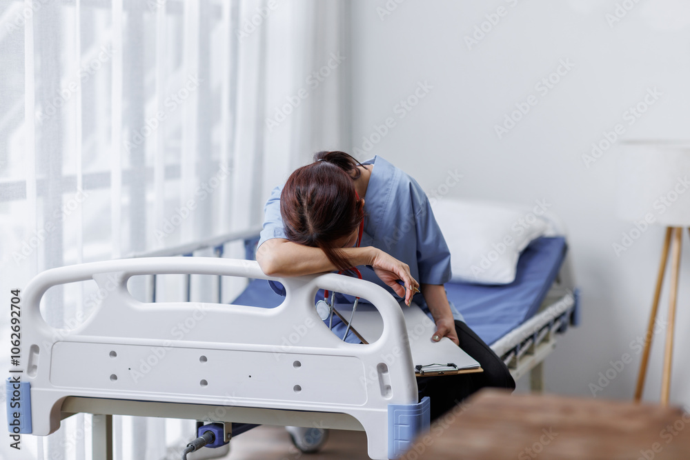 Medical nurse is on bed in hospital sitting down a the hospital ...