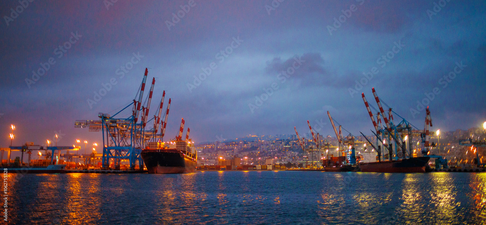 view of Haifa Port and the city at night. Container terminal. Haifa ...