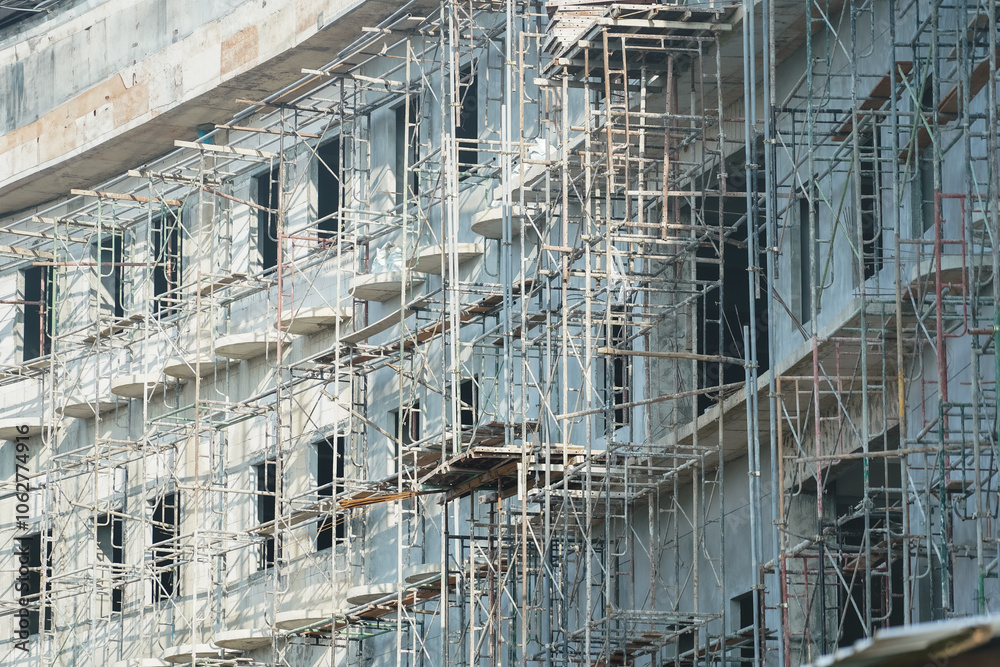 Extensive scaffolding providing platforms for work in progress on a new ...