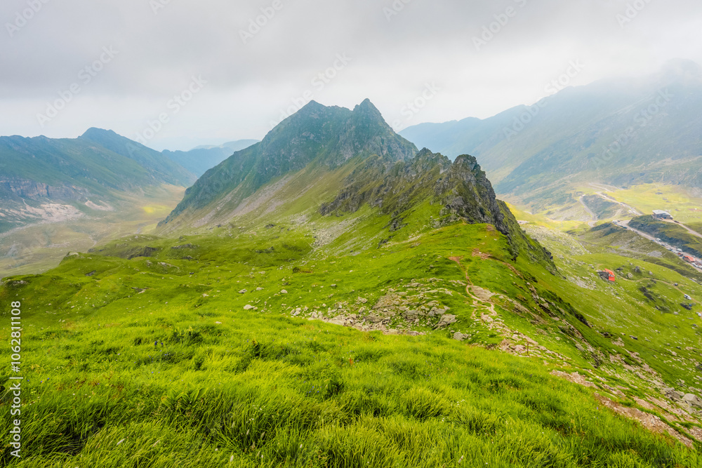 Hiking in Fagaras mountains on Iezerul Caprei peak over Transfagarasan ...