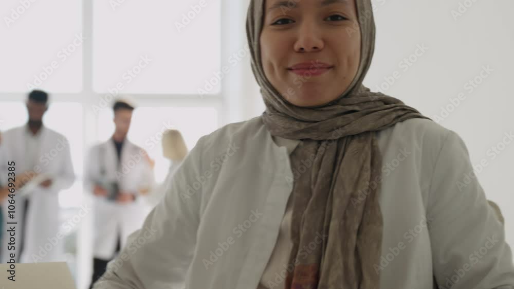 Smiling professional female doctor muslim psychiatrist cardiologist in ...