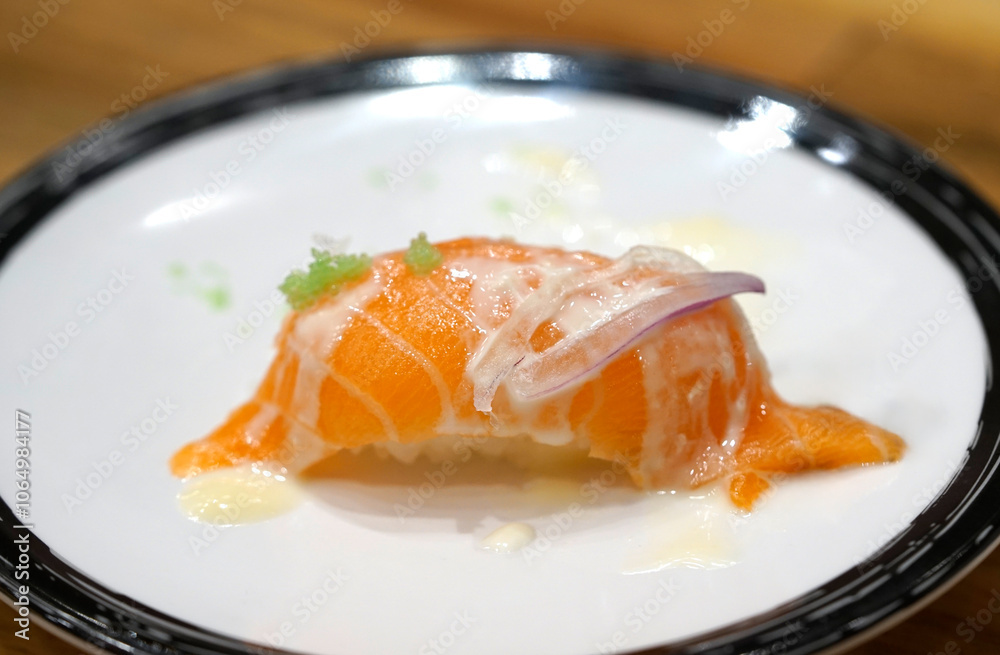 Japanese Nigiri sushi with raw salmon fillet. Sake sashimi with rice ...