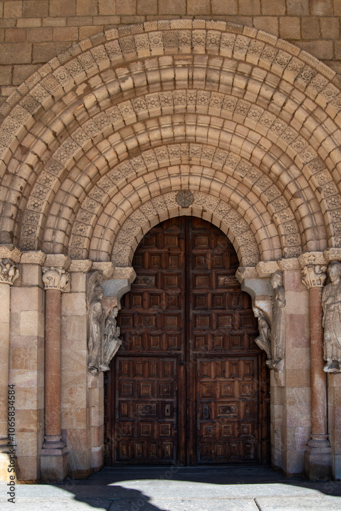 Photo & Art Print Romanesque style entrance with a splayed arch and ...