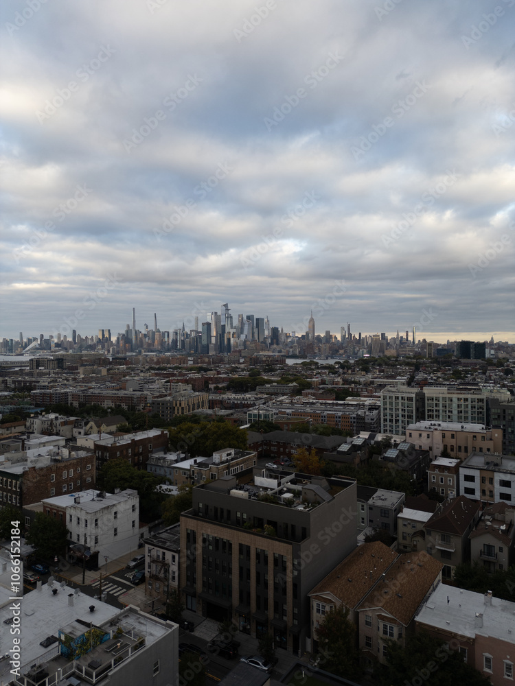 Wide aerial view capturing the neighborhoods of Hoboken and Jersey City ...