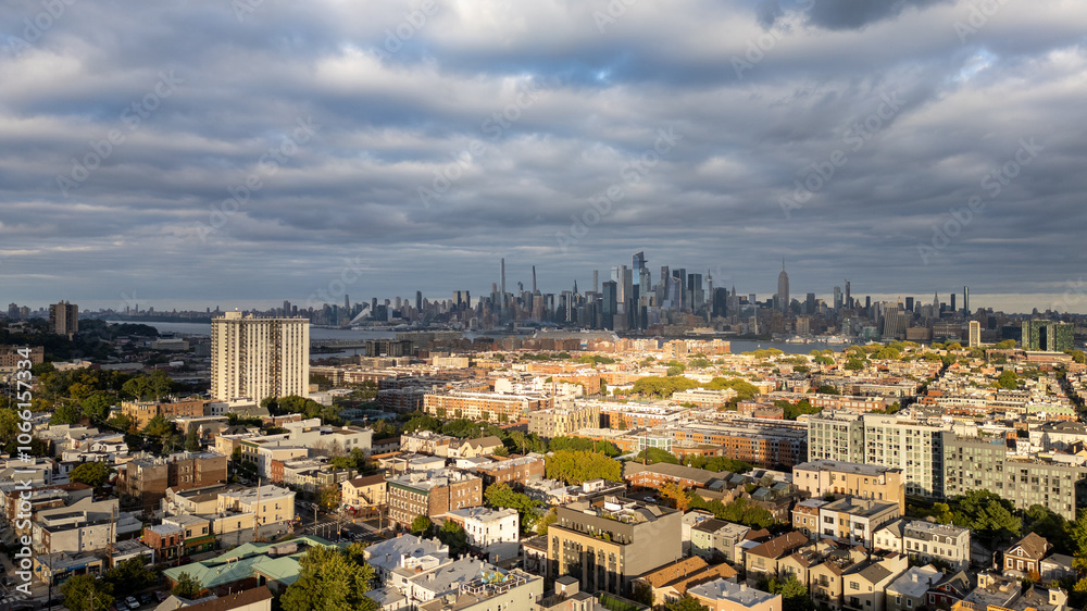 Wide aerial view capturing the neighborhoods of Hoboken and Jersey City ...