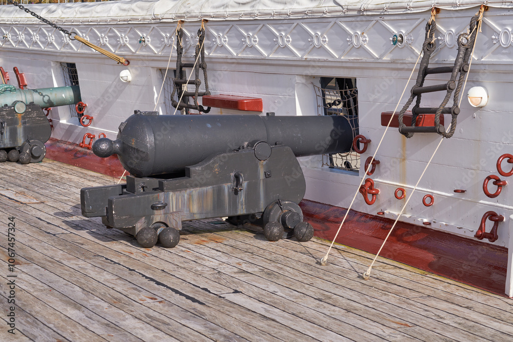 Museum, boat and cannon on deck for travel, sightseeing and landmark ...