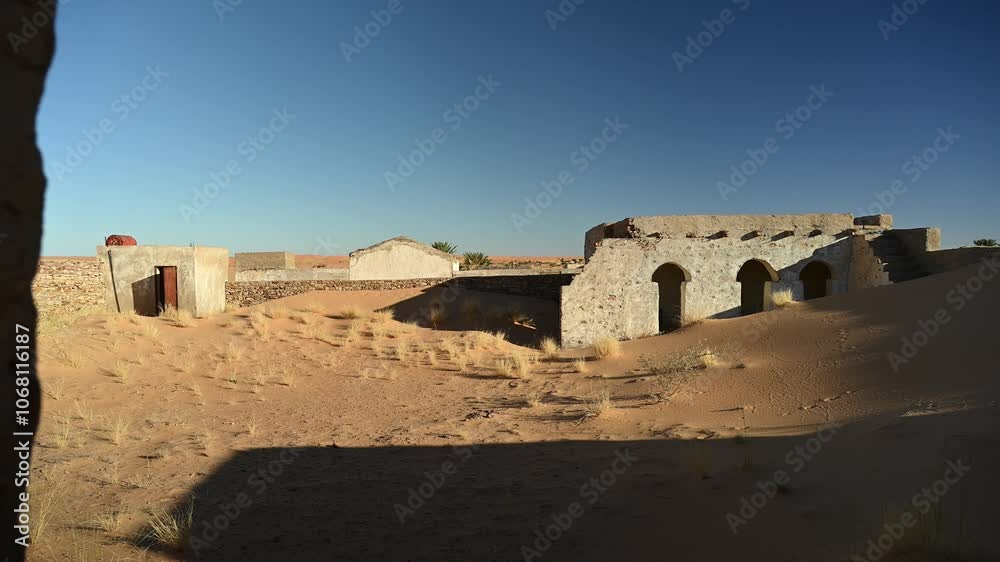 Building partially covered by sand, Sahara desert, Mauritania ...