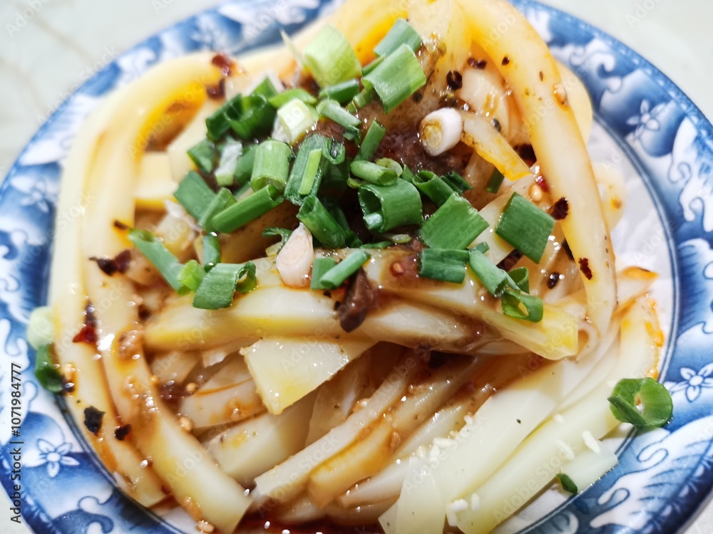 LiangFen, literally meaning cold powder, is a noodle made of bean ...