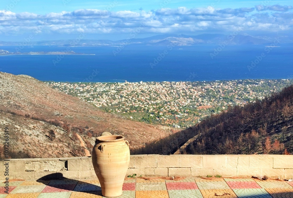Photo of the charred slopes of Mount Pentelicus in Dionysos, with a ...