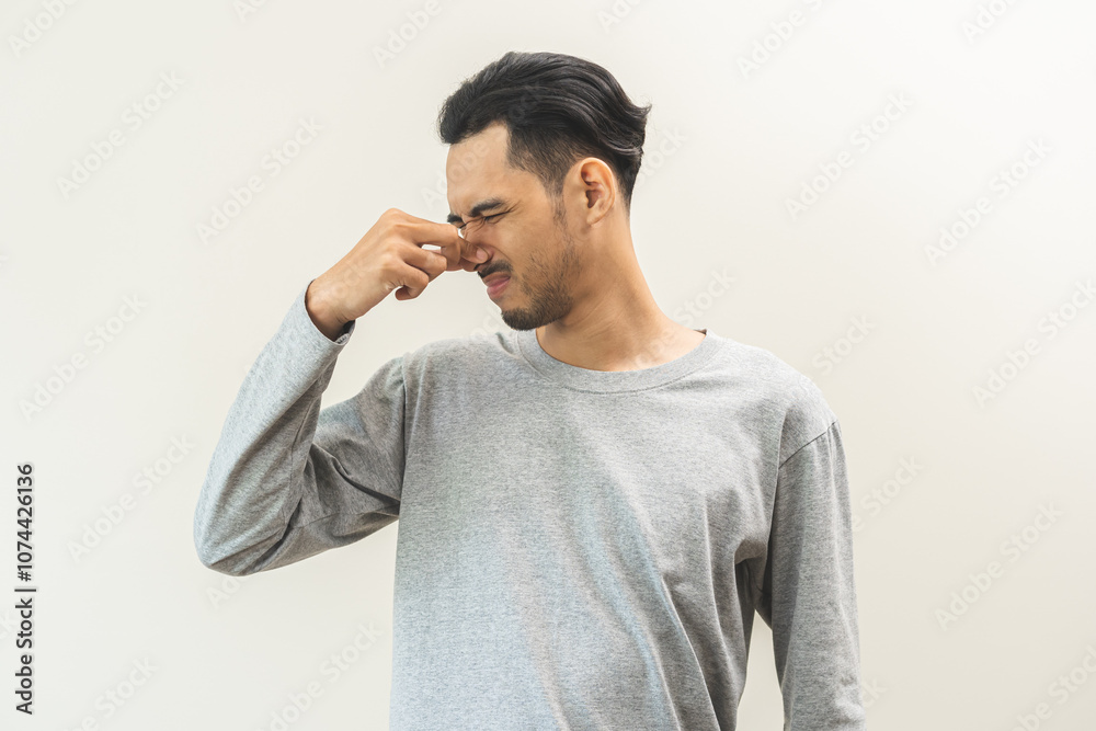 Bad smelling, deodorant asian young man hand squeeze, covering nose ...