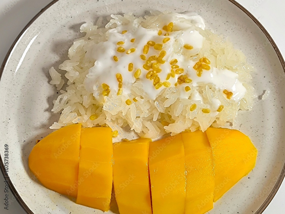 Mango sticky rice. Thai dessert made with glutinous rice, fresh mango ...