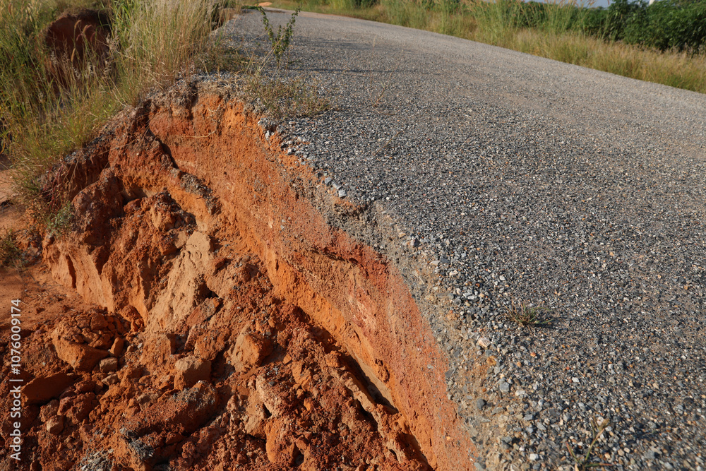 Landslide caused by rains occurs broken road asphalt. Broken asphalt ...
