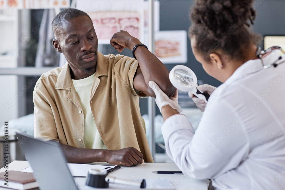 Portrait of adult African American man visiting dermatologist with ...