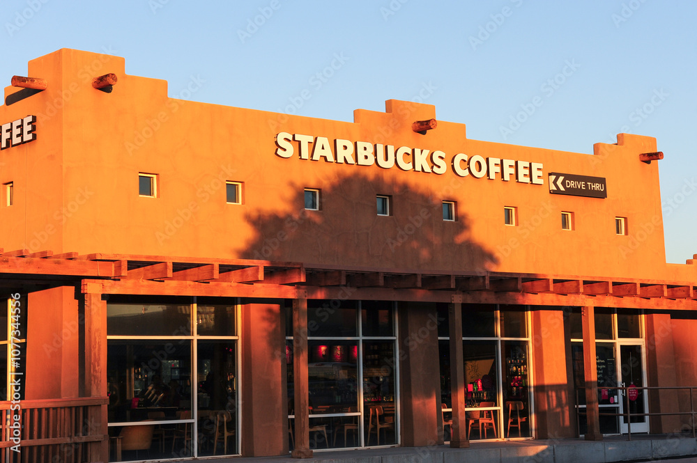 Exterior lateral view of a Starbucks Coffee shop building displaying ...