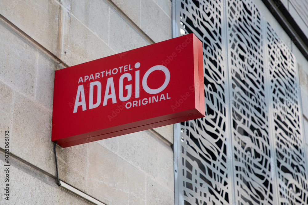Adagio aparthotel original chain logo brand and sign text in entrance ...