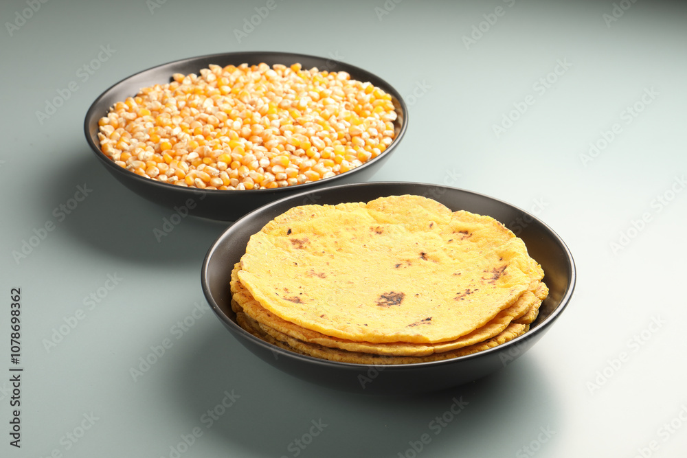 Makki ki roti also known as makki di roti is a flat unleavened bread ...