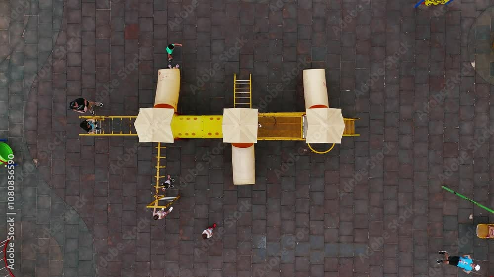 Children play on playground in a park. Static overhead shot Stock Video ...