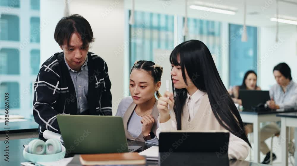 Students, laptop and education teamwork at university with Japanese ...