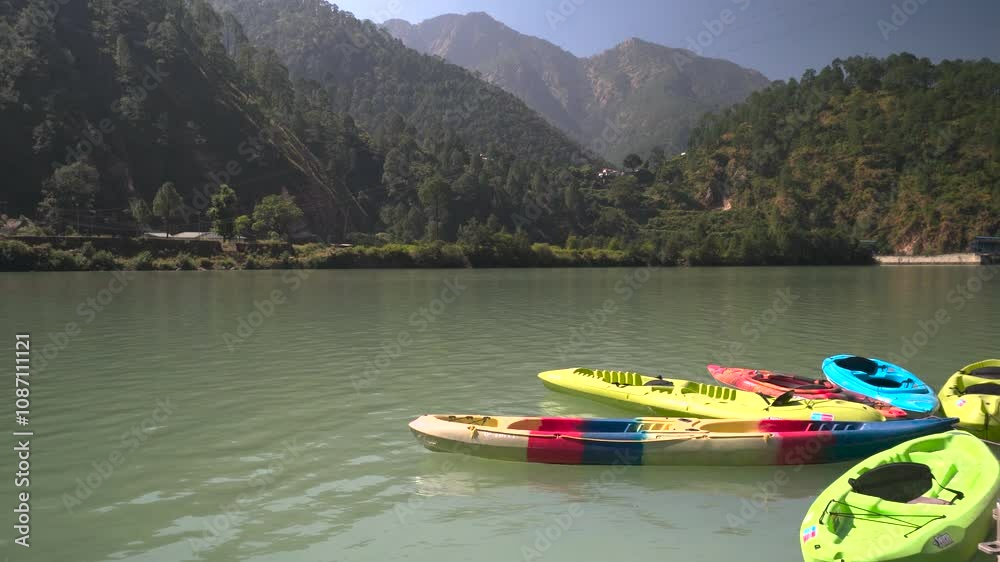 Colorful Boats at Lake Maneri Shore with Maneri Dam on Bhagirathi River ...