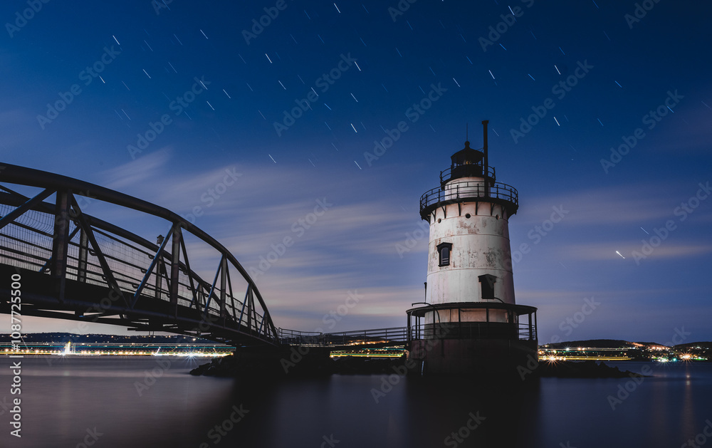 Tarrytown lighthouse in Sleepy Hollow, New York at night with calm ...