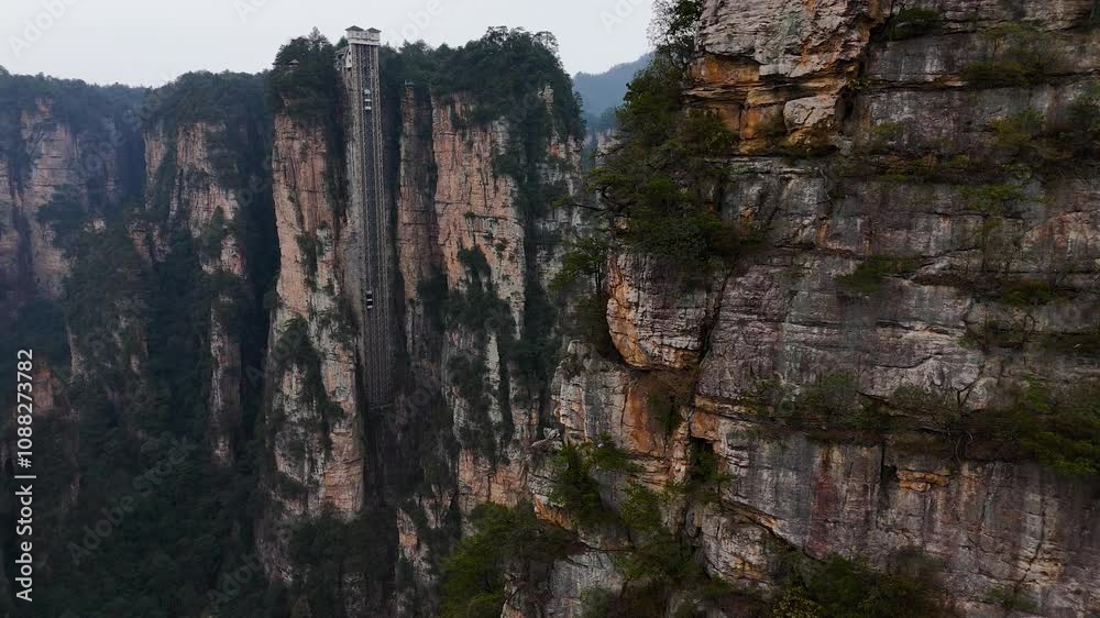 Bailong Elevator, the world's tallest outdoor lift, ascends the sheer ...