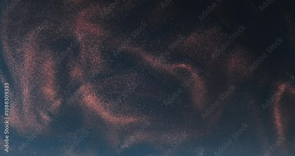 Shimmering particles texture. Paint flow. Bronze red color shiny fluid ...