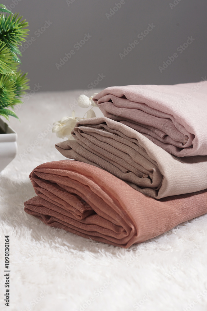 Pile of hijabs in soft colors isolated on a white background. Hijab ...