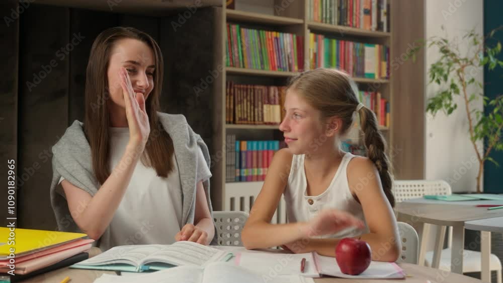 Caucasian woman child little girl elementary school teacher tutor ...