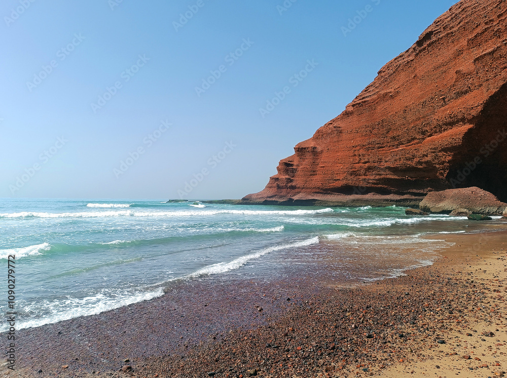 Spectacular natural red arch on atlantic ocean coast, Legzira (or Gzira ...