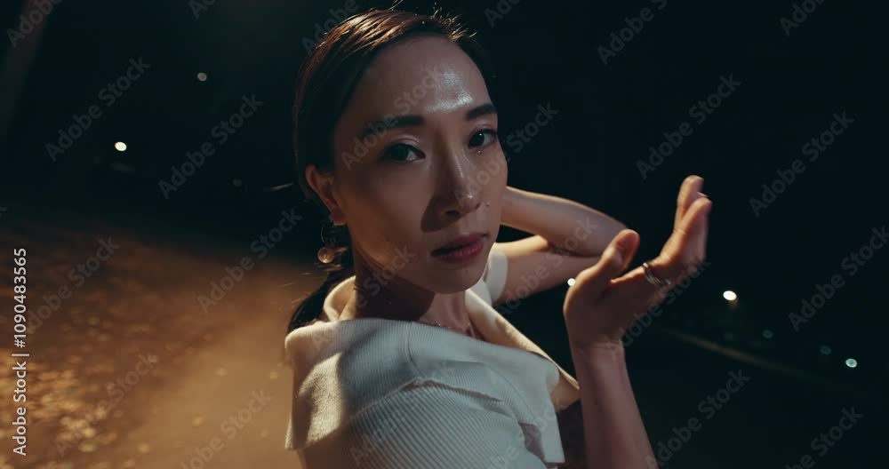 Woman, dancing and face at night in city, creative and motion for ...