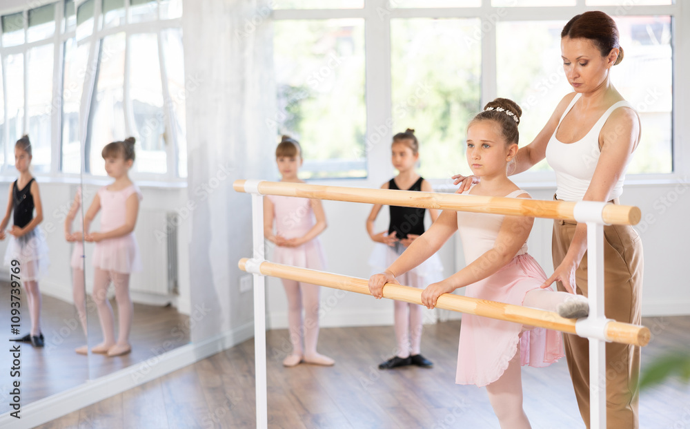 Ballet school children girls students prepare for classes, near ballet ...
