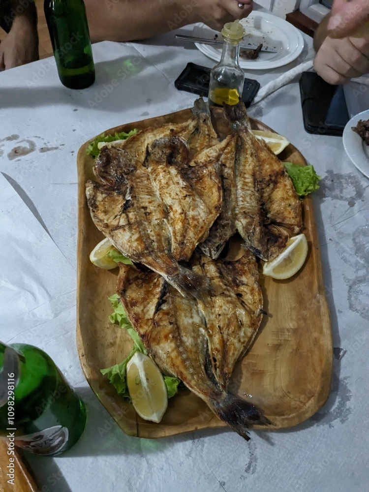 A traditional Albanian BBQ showcasing authentic grilled dishes ...