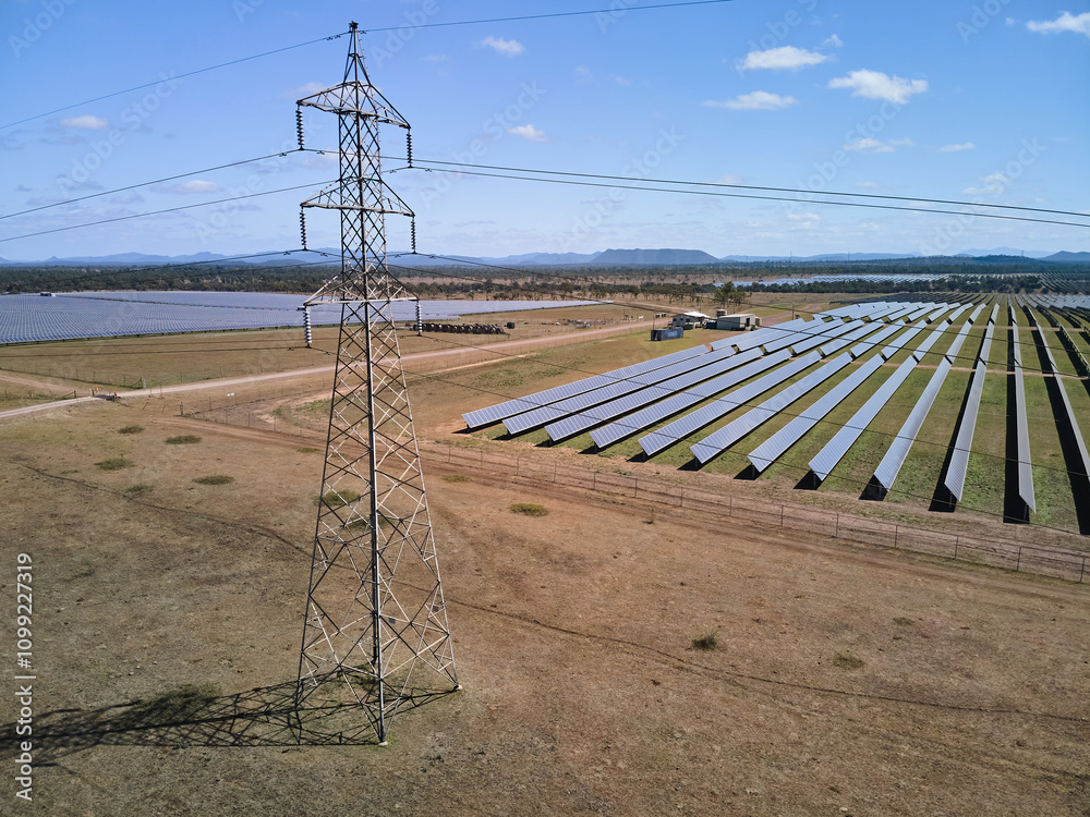 Power pylon & solar farm. Stock Photo | Adobe Stock