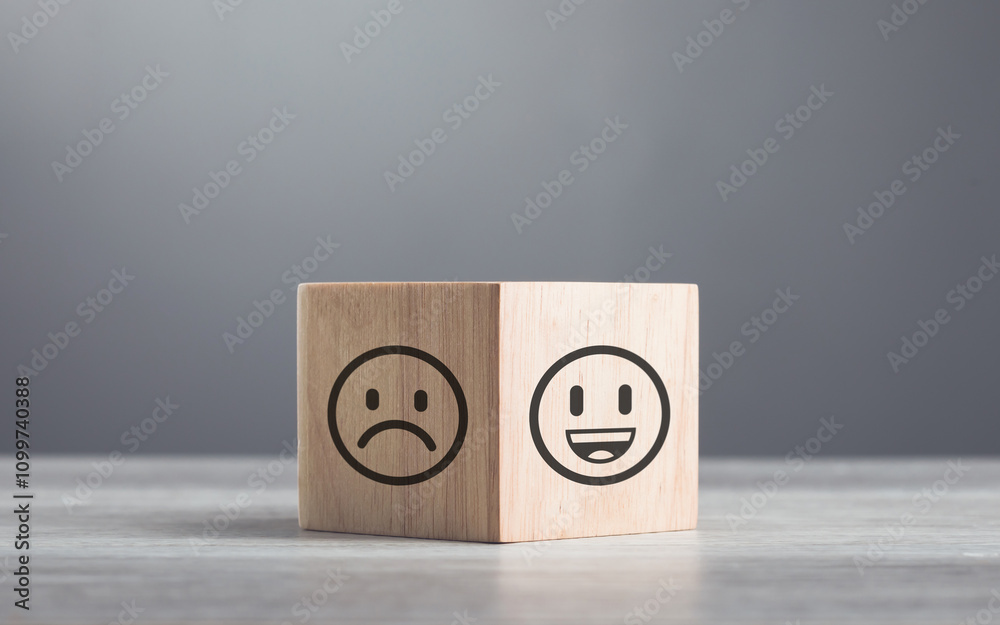 Poster Wooden blocks displaying a sad face transitioning to a happy ...