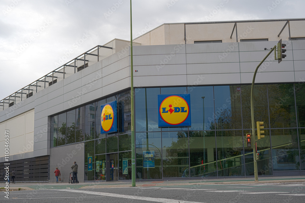 Modern Lidl supermarket exterior with glass facade and signage seville ...