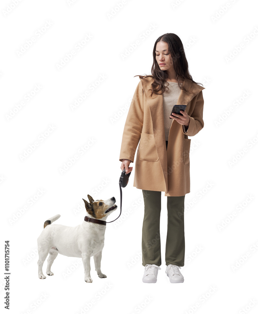 Pet owner walking the dog and checking the smartphone Stock Photo ...