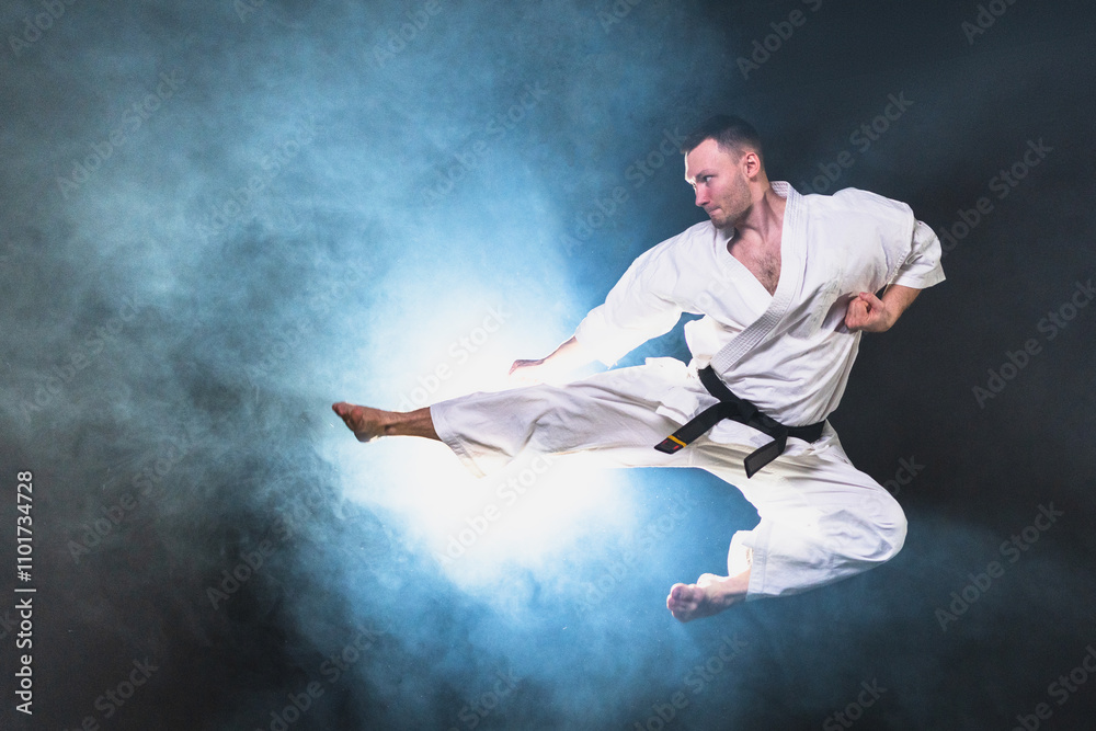 Photo & Art Print Strong man fighter in white kimono for karate martial ...