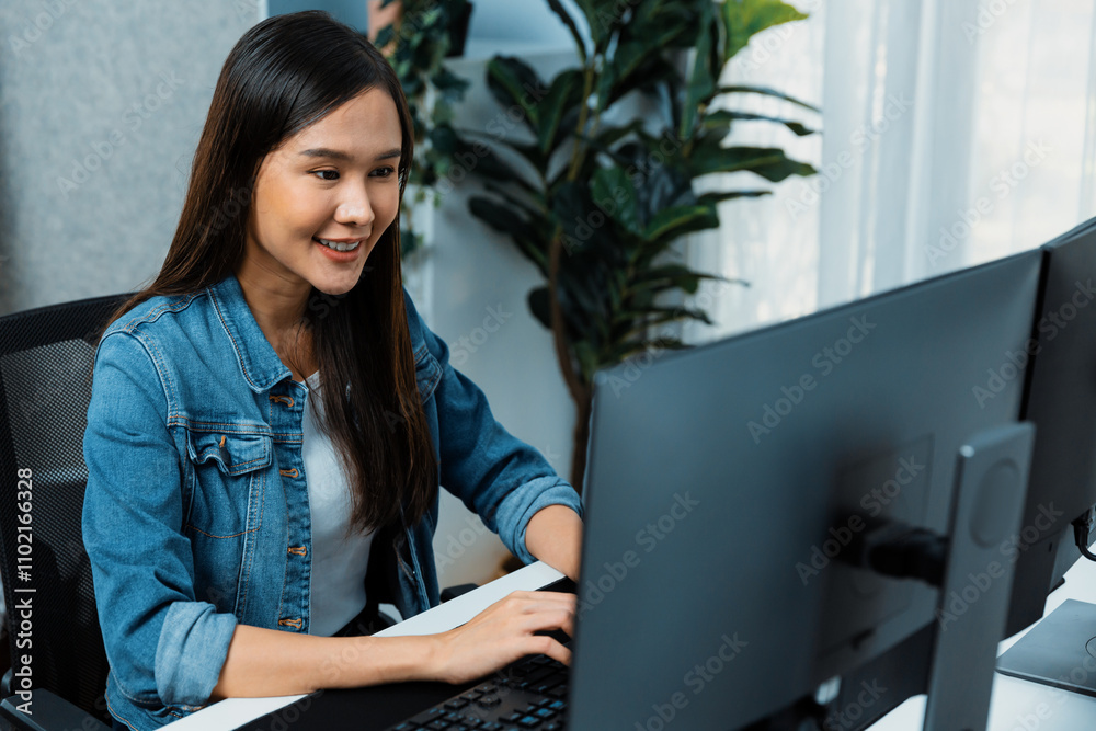 Working young beautiful asian creative manager typing keyboard to ...