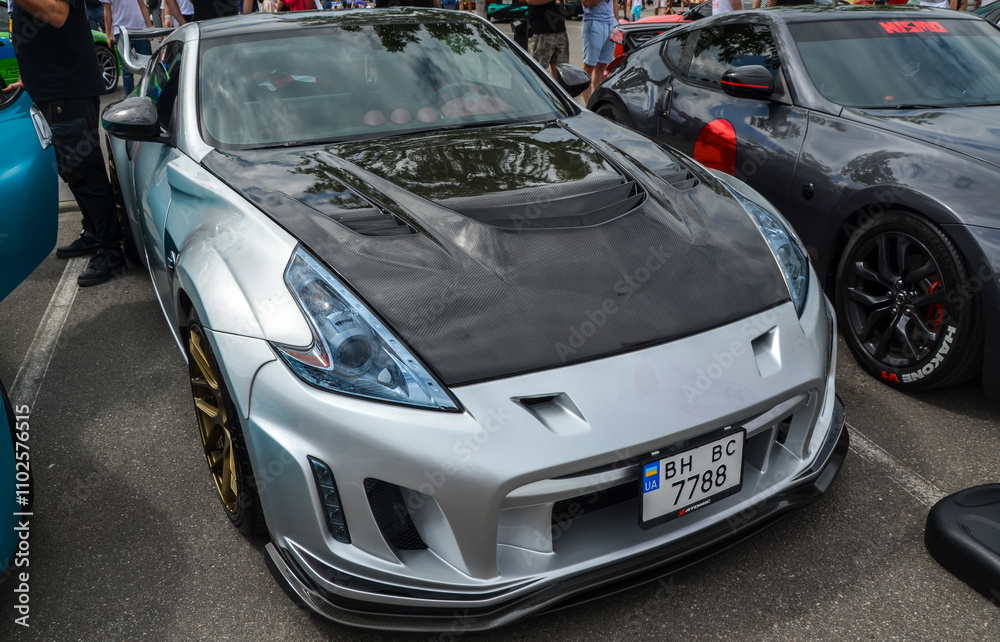 Grey coupe 2015 Nissan 370Z, a high-performance sports car that ...