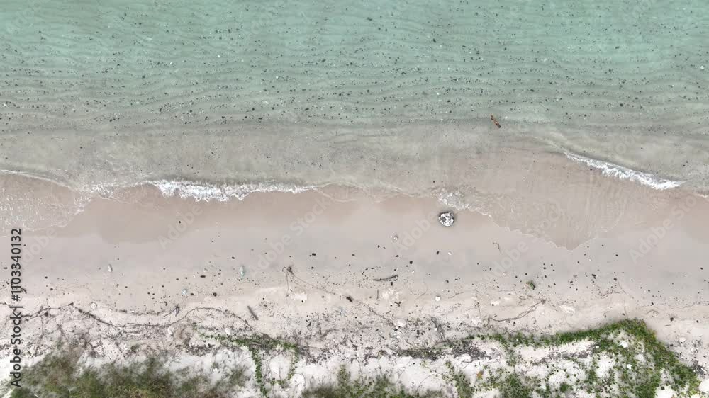 Tropical Beach with the soft wave water of the sea on the sandy beach ...