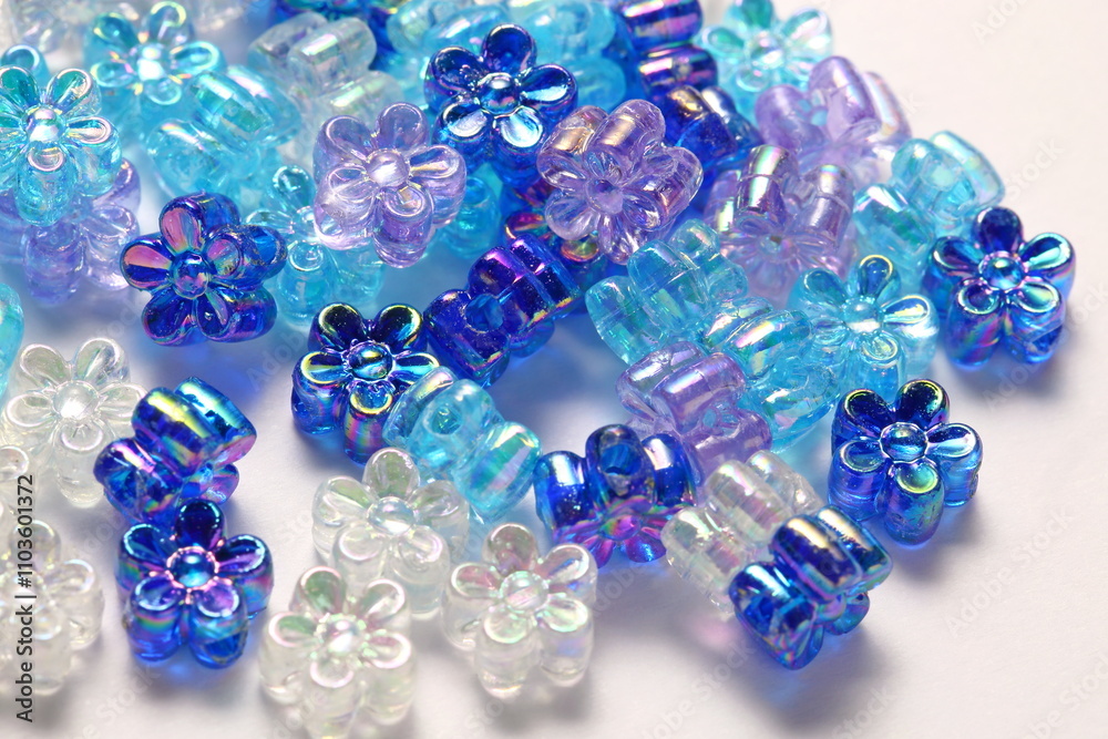 Flatlay blue Plastic flower on white background. blue flower at the ...